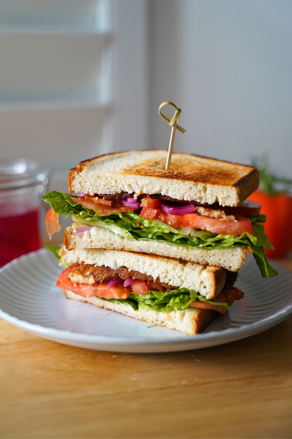 Loaded Vegan BLT with Smoky Tempeh & Pickled Onions - The Conscious Cook
